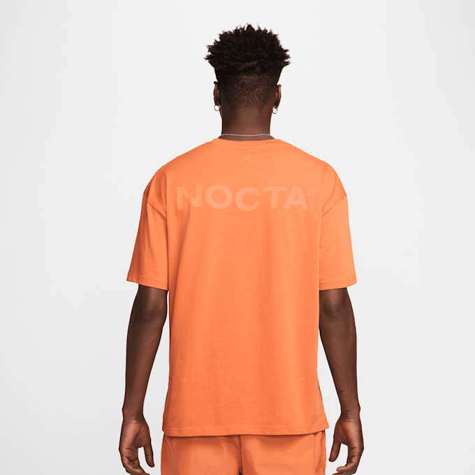Acheter Nike Nocta M NRG CS TEE SS hot curry/orange trance orange | SNIPES