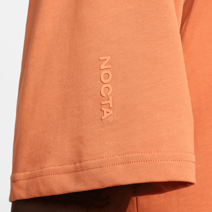 Acquista Nike Nocta M NRG CS TEE SS hot curry/orange trance arancione ...