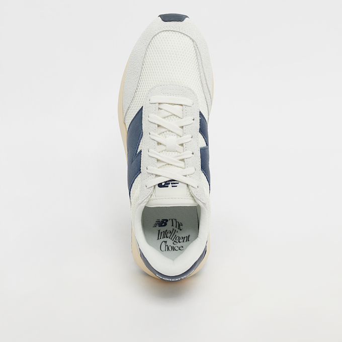 Shop New Balance 370 beige | SNIPES