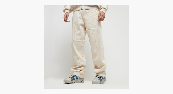 Compra Karl Kani Five Pocket Patchwork Baggy Pants beige | SNIPES