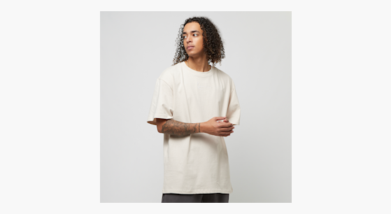Kupi Karl Kani Small Signature Essential Tee bež | SNIPES