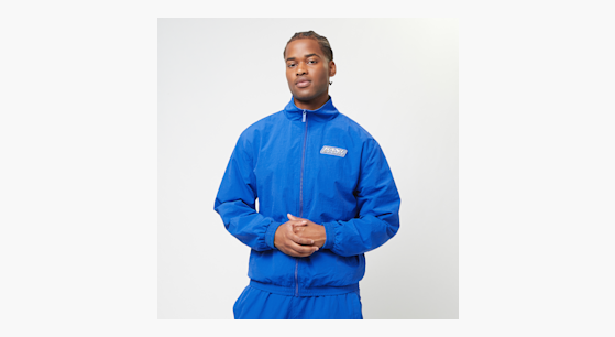 Compra Karl Kani Sport Patch Essential Trackjacket azul | SNIPES
